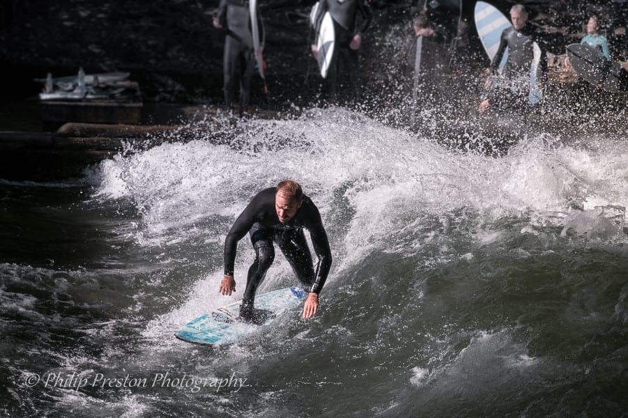 Eisbachwelle / city surfers, Munich, Germany